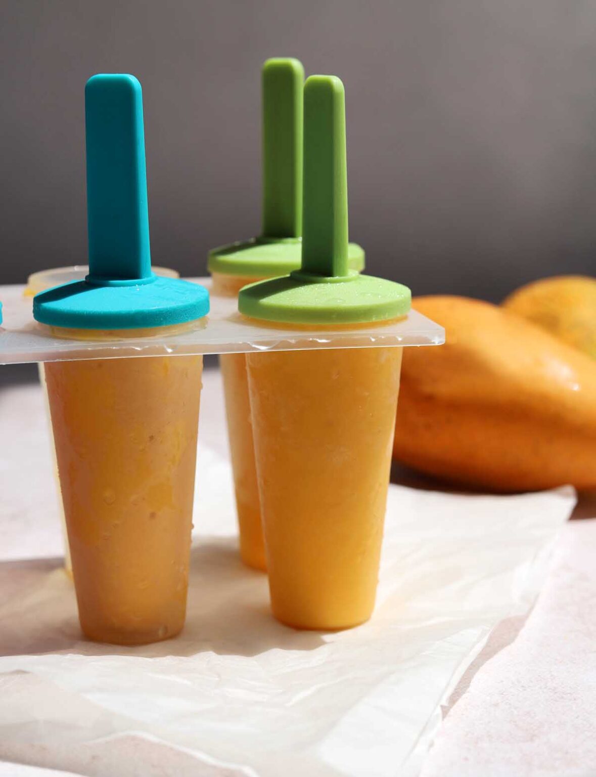 Creamy Mango Popsicles - Scientifically Sweet
